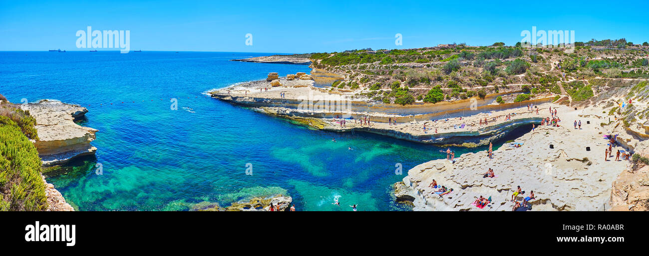 MARSAXLOKK, MALTA - JUNE 18, 2018: Panorama of the natural pool of St ...