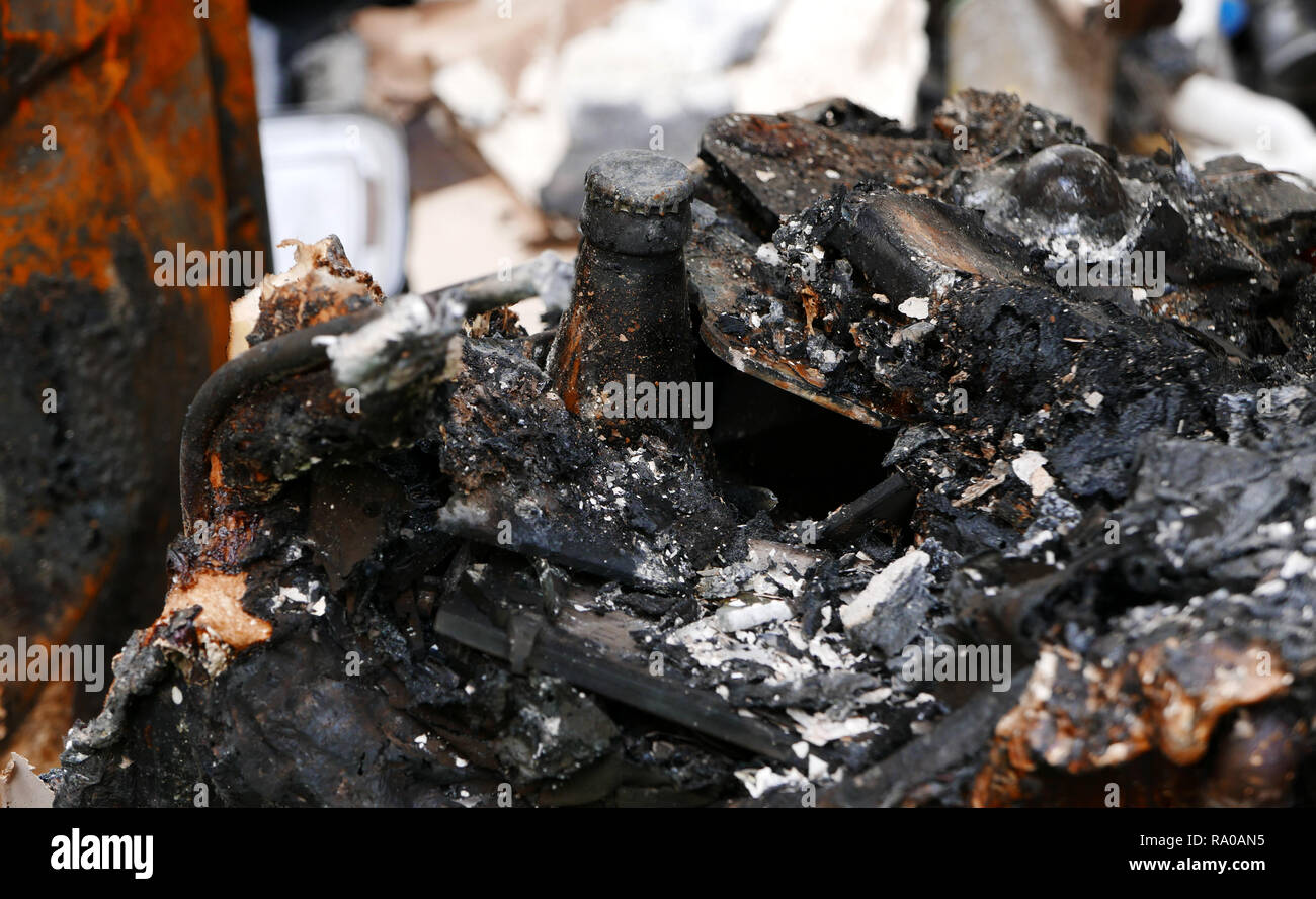 Remains burning in a refrigerator, on the sidewalk, Paris, France ...