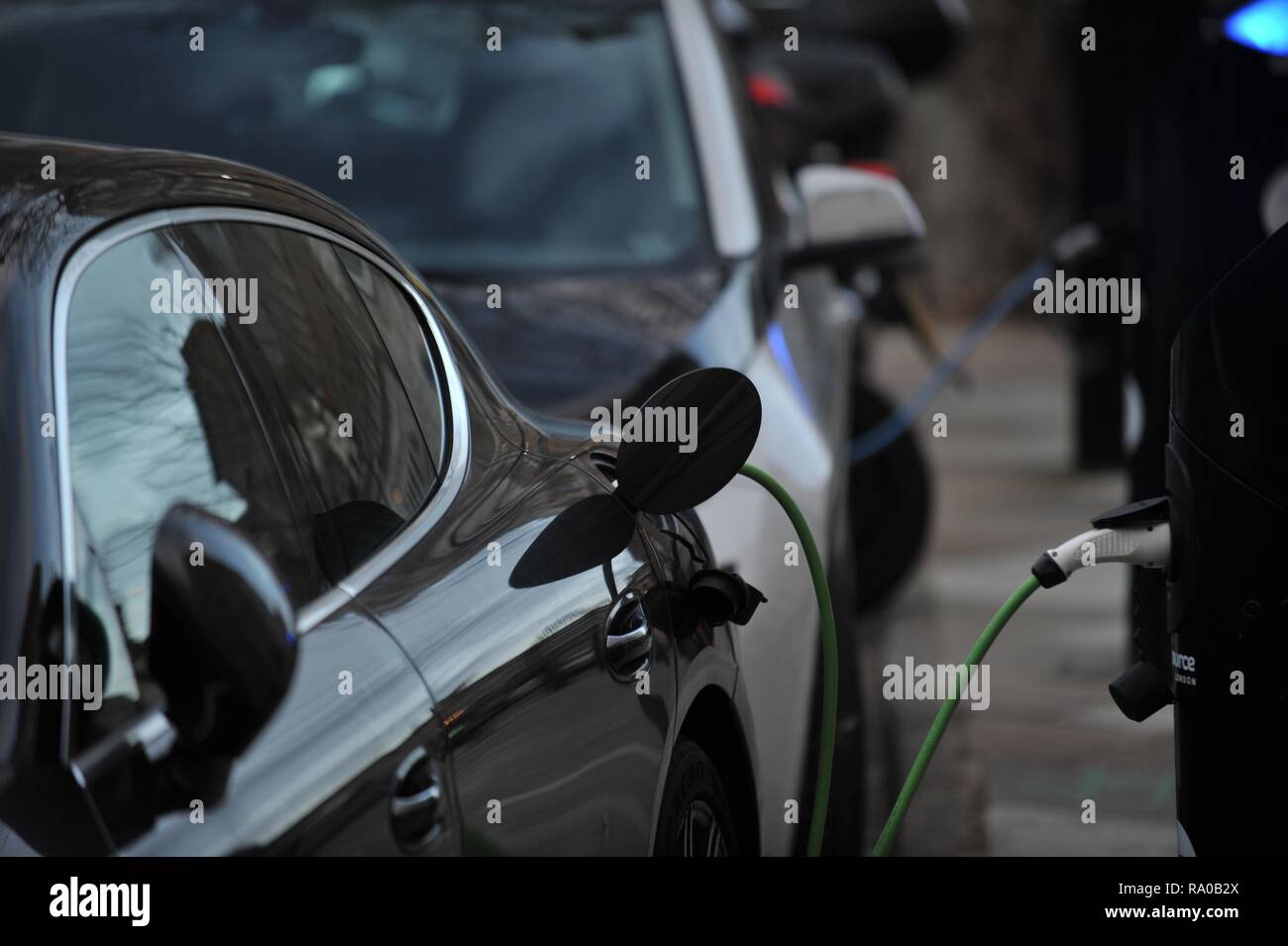 electric vehicles being charged Stock Photo - Alamy