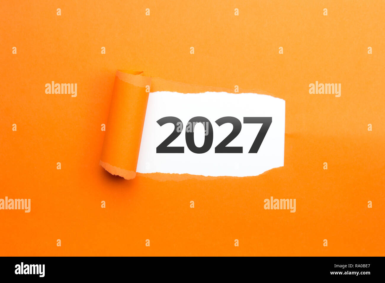 surprising Number / Year 2027 orange background Stock Photo - Alamy