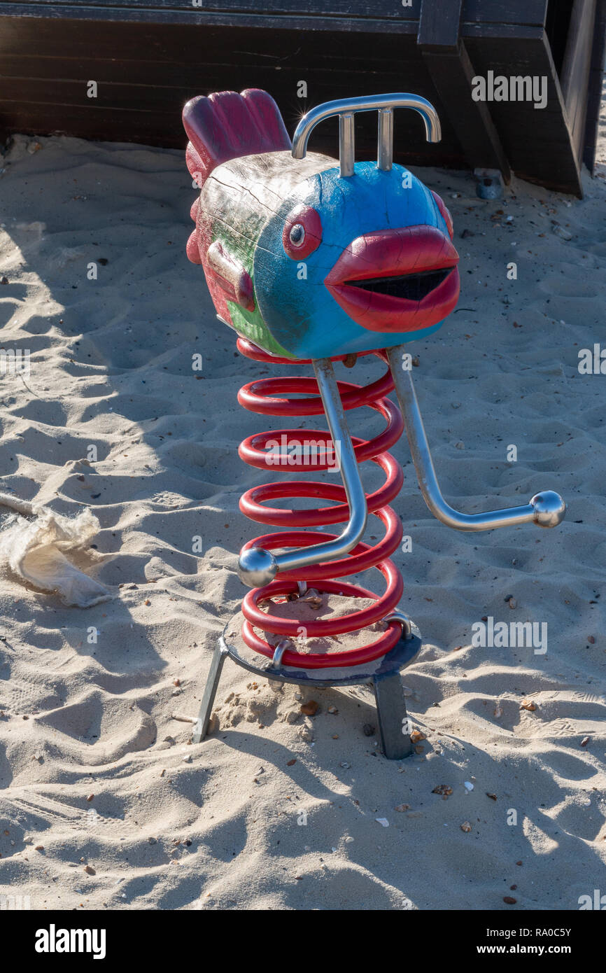 Ride on playground equipment in a children's playground Stock Photo - Alamy