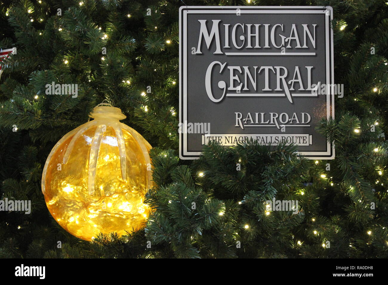 Decorated Christmas tree with festive logo of the Michigan Central ...