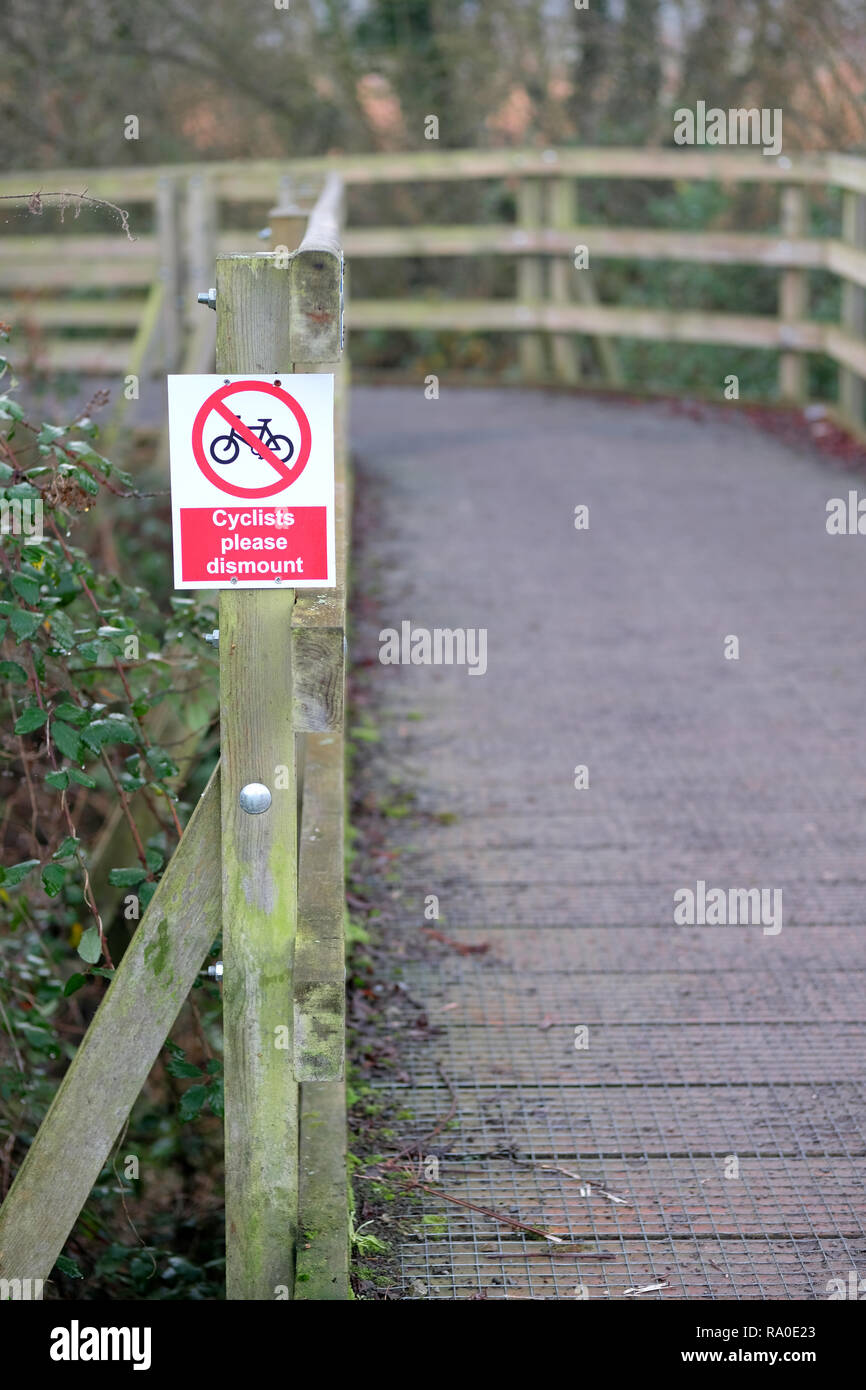 December 2018 - No cycling sign on a wooden pedestrian footbridge Stock ...