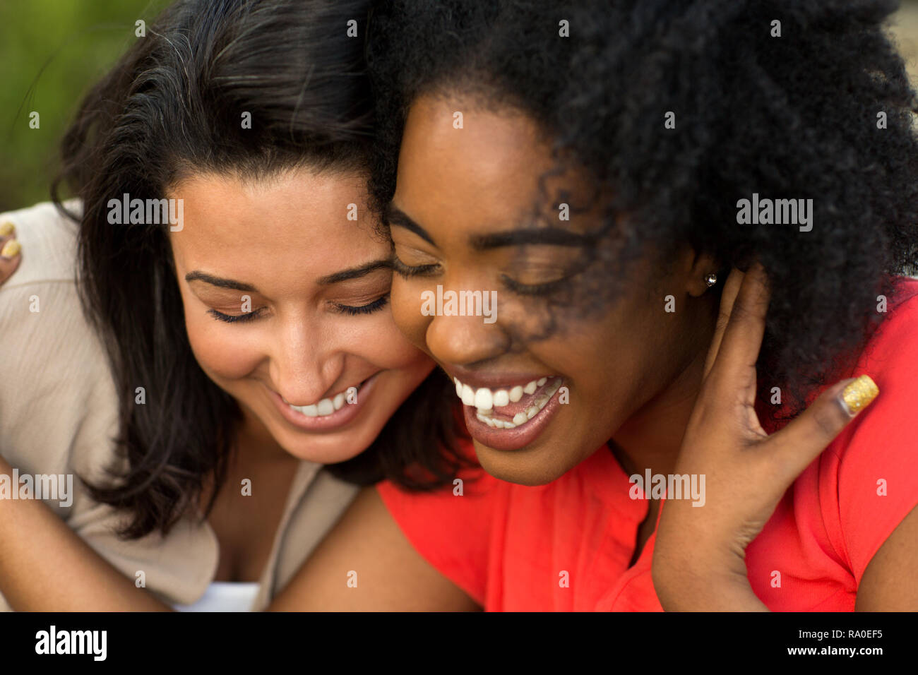 Diverse group of friends talking and laughing Stock Photo - Alamy