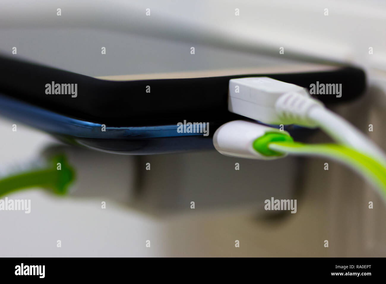 Phones plugged into socket hi-res stock photography and images - Alamy