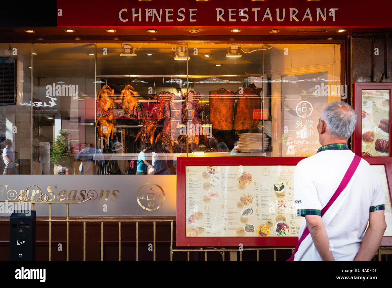 Restaurant window in Chinatown, London Stock Photo - Alamy