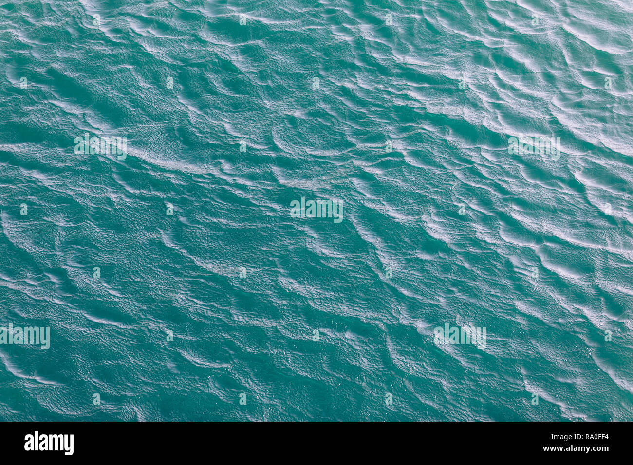 Background shot of aqua sea water surface. Sea surface aerial view ...
