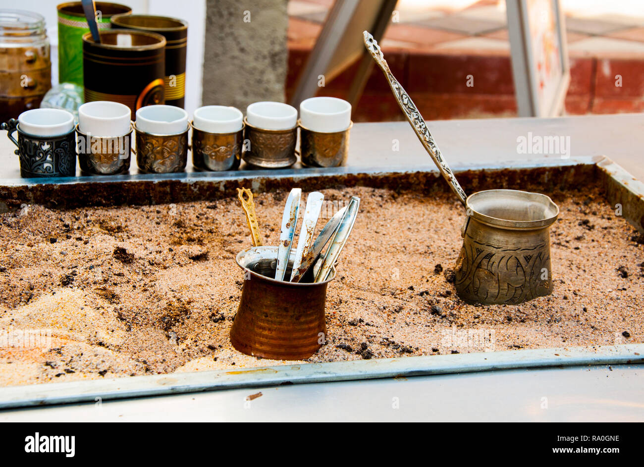 Traditional Turkish coffee equipment on sand. Turk kahvesi famous in ...