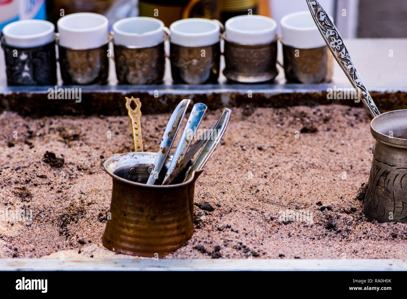 Traditional Turkish coffee equipment on sand. Turk kahvesi famous in ...