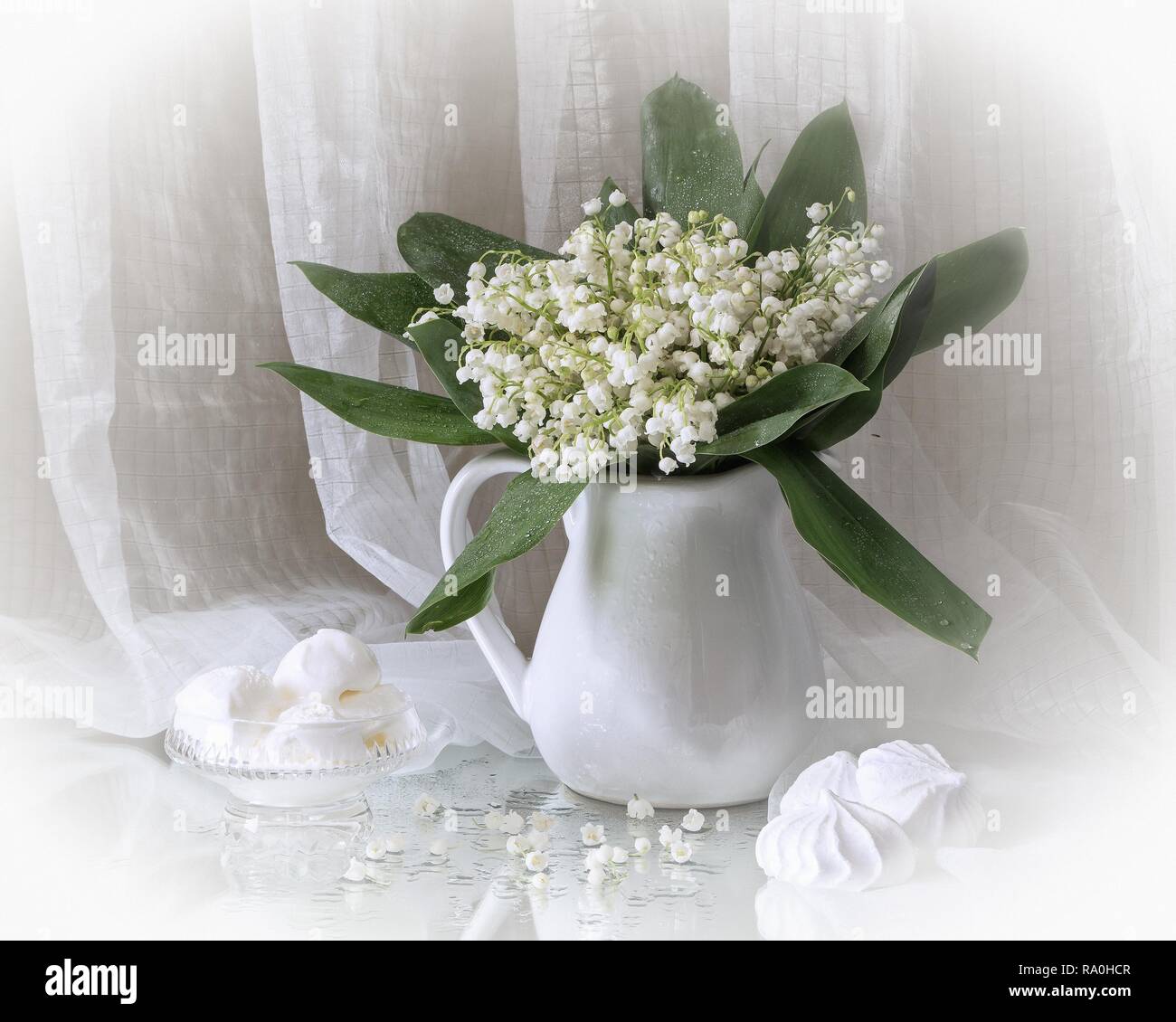Still life with bouquet lily of the valley Stock Photo - Alamy