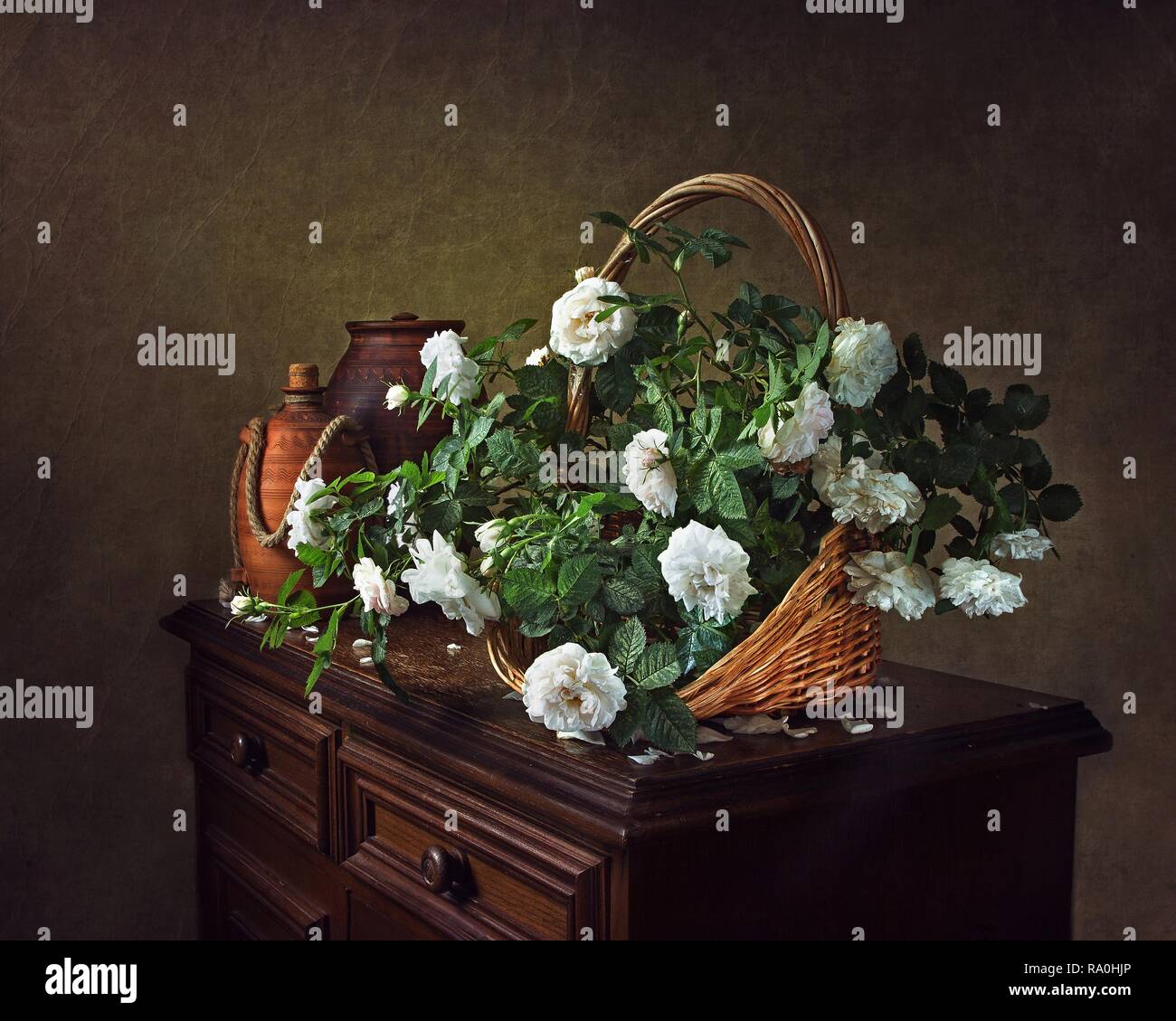Still life with bouquet of white spray roses Stock Photo - Alamy