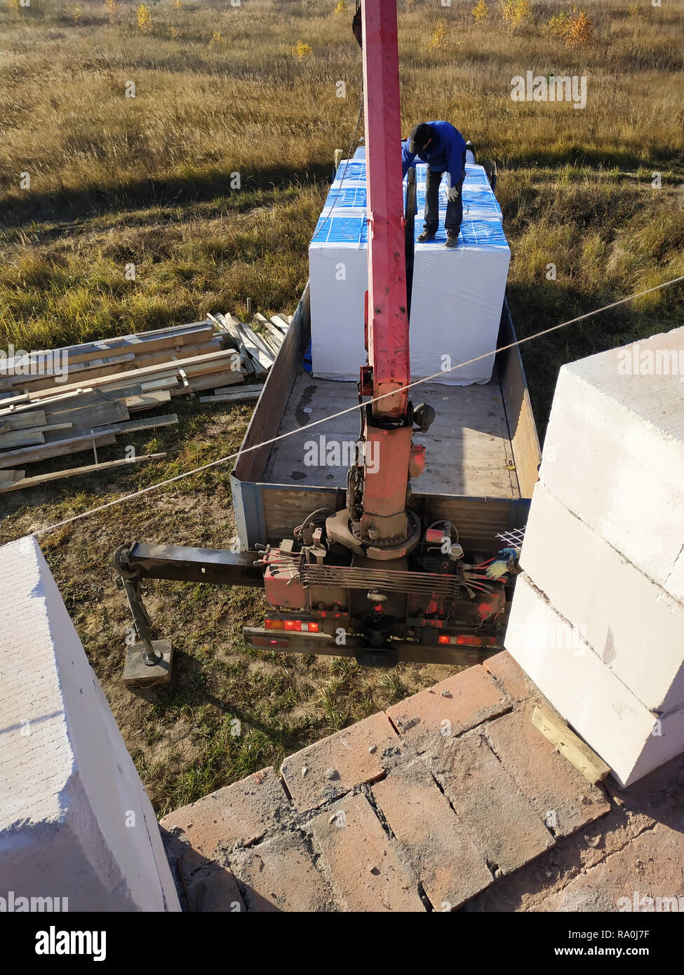 Crane lifting heavy blocks building hi-res stock photography and images ...
