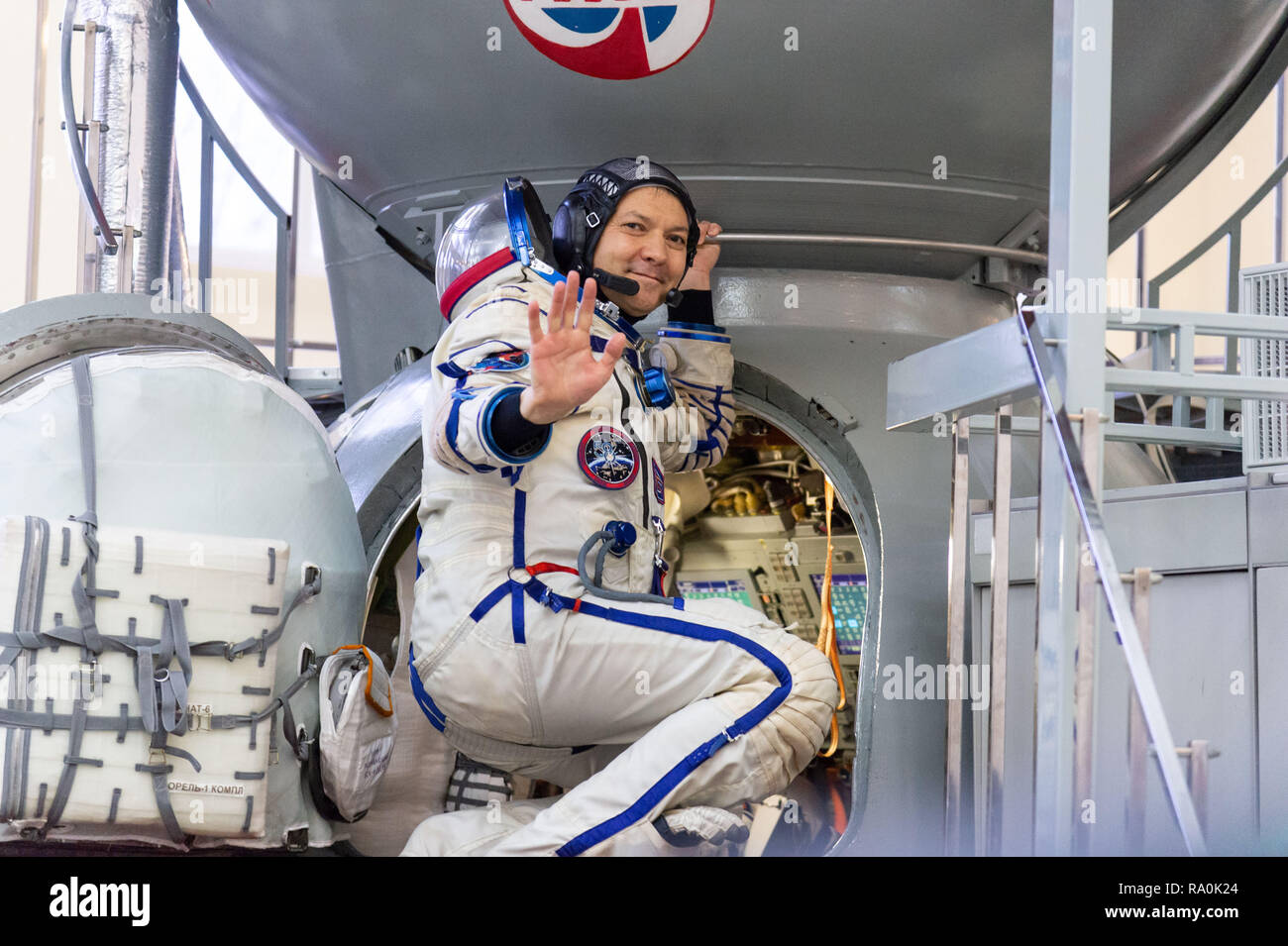 International Space Station Expedition 58 crew member Oleg Kononenko of Roscosmos waves as he ...