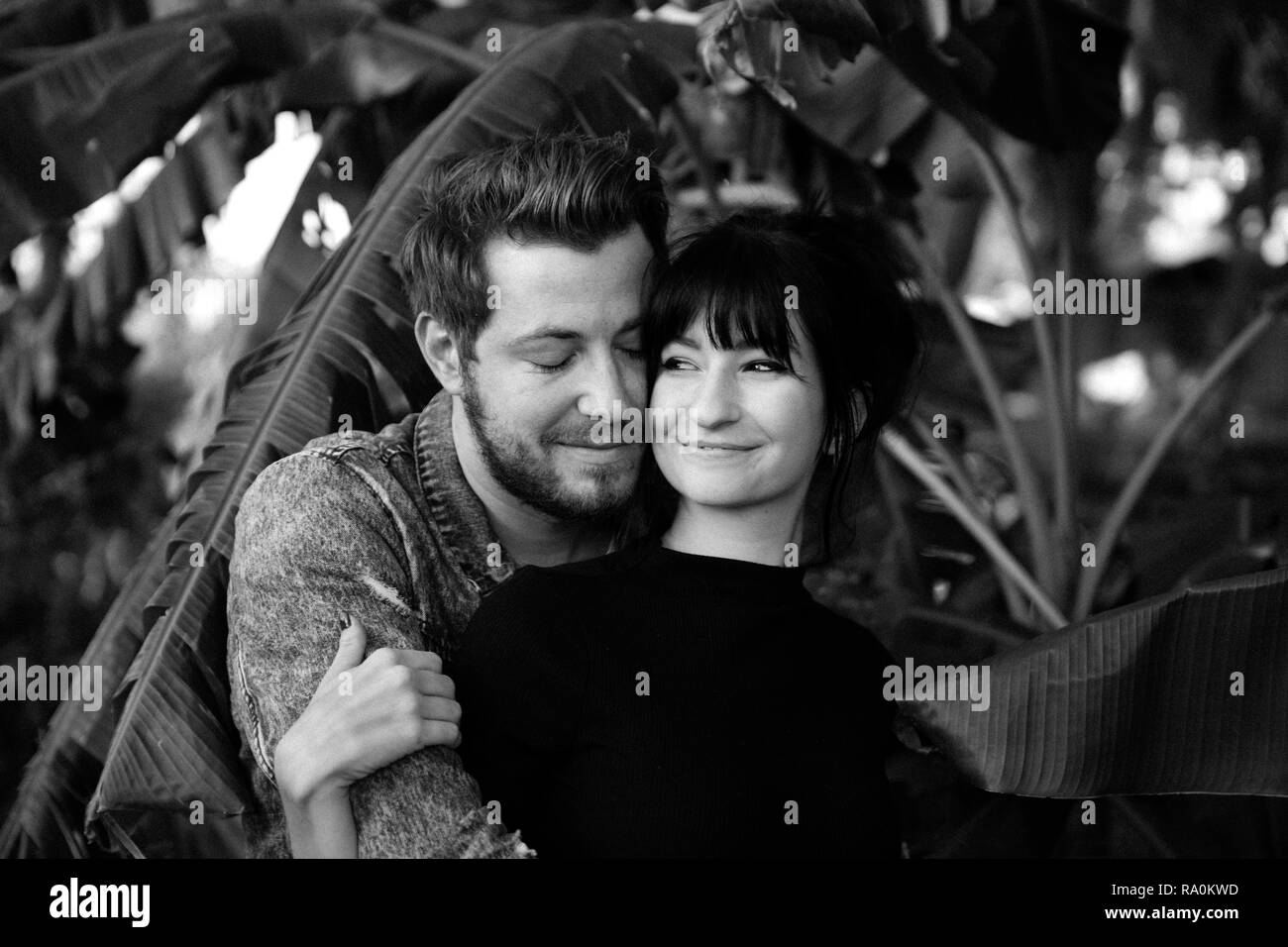 Two People Hugging In Black And White