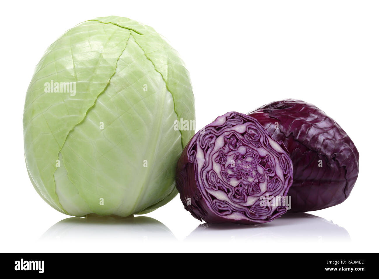 Fresh green and red cabbage with slice isolated on white background ...