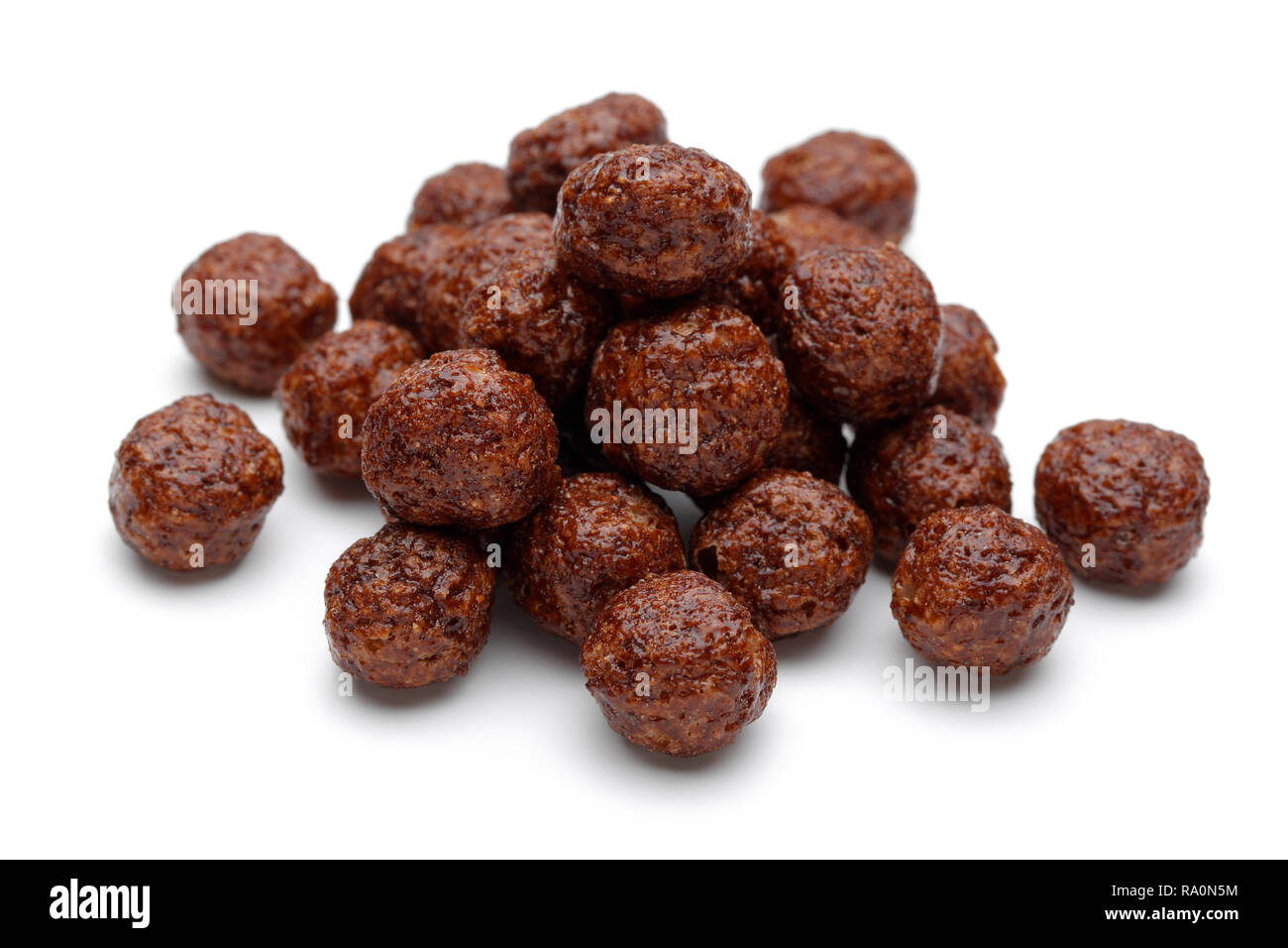 Chocolate corn balls isolated on white background. Cornflakes, cereals ...