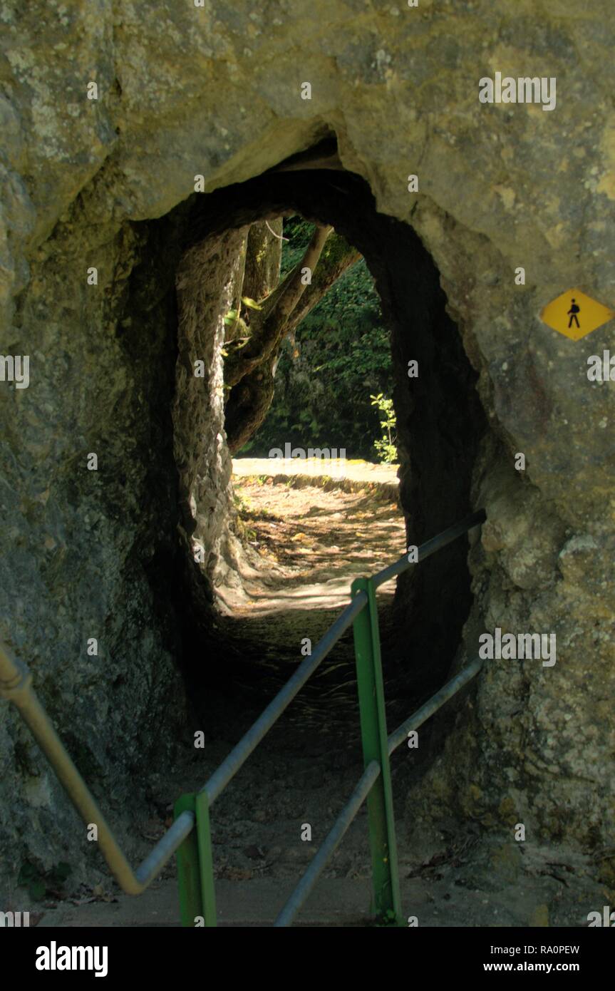 Opening cut through rock wall for hiking path, Gorges de l'Areuses ...