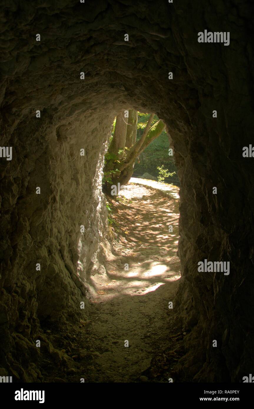 Opening cut through rock wall for hiking path, Gorges de l'Areuses ...