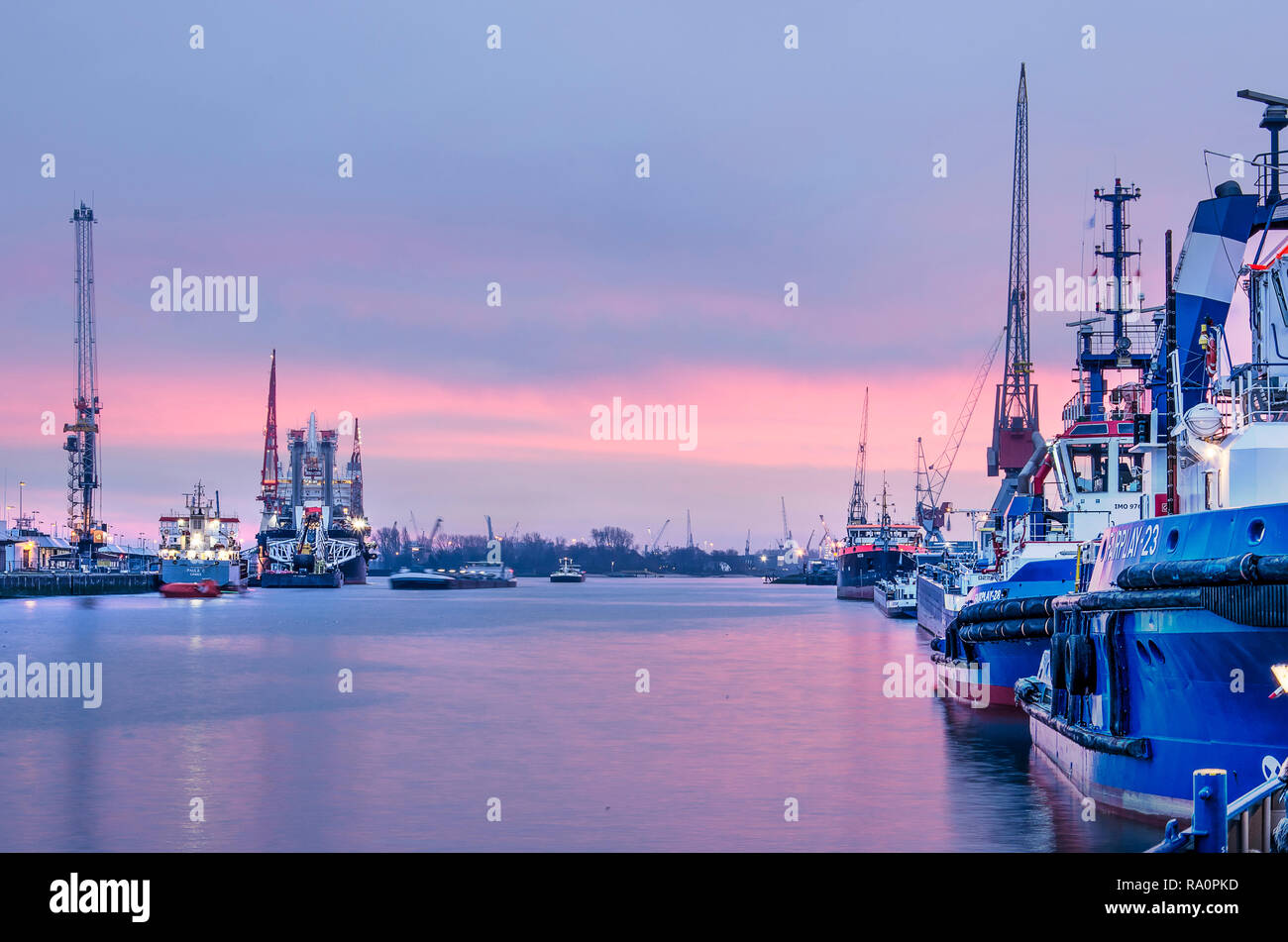 Rotterdam, The Netherlands, December 27, 2018: sky coloring red, just ...