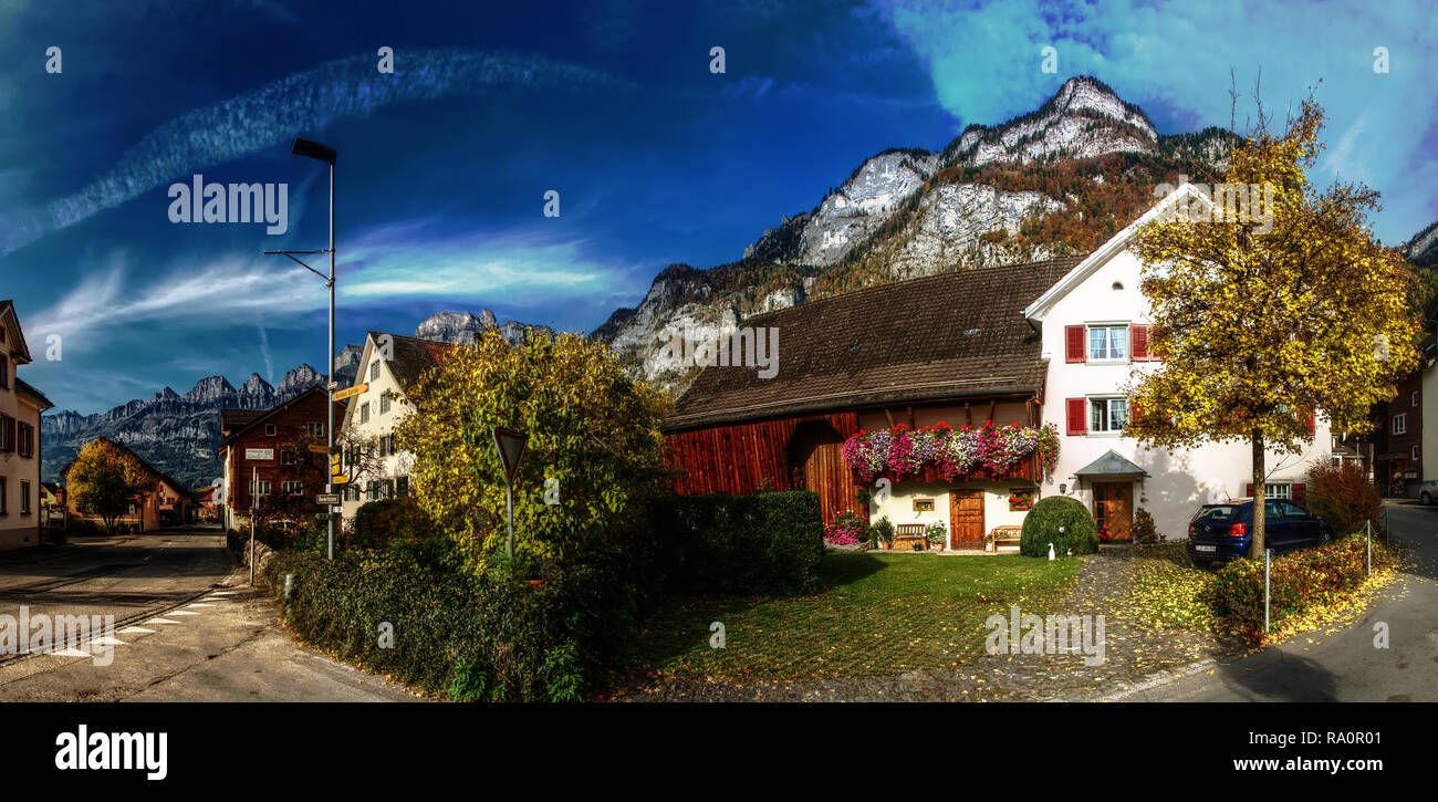Farmhouse in Swiss alpine village of Berschis Stock Photo - Alamy