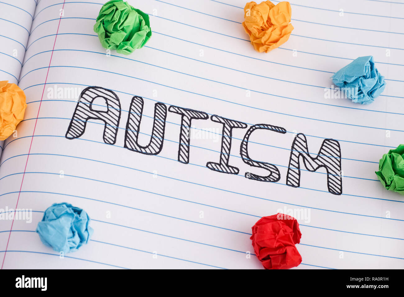 Autism. Autism spectrum disorder. Autism word on notebook sheet with ...