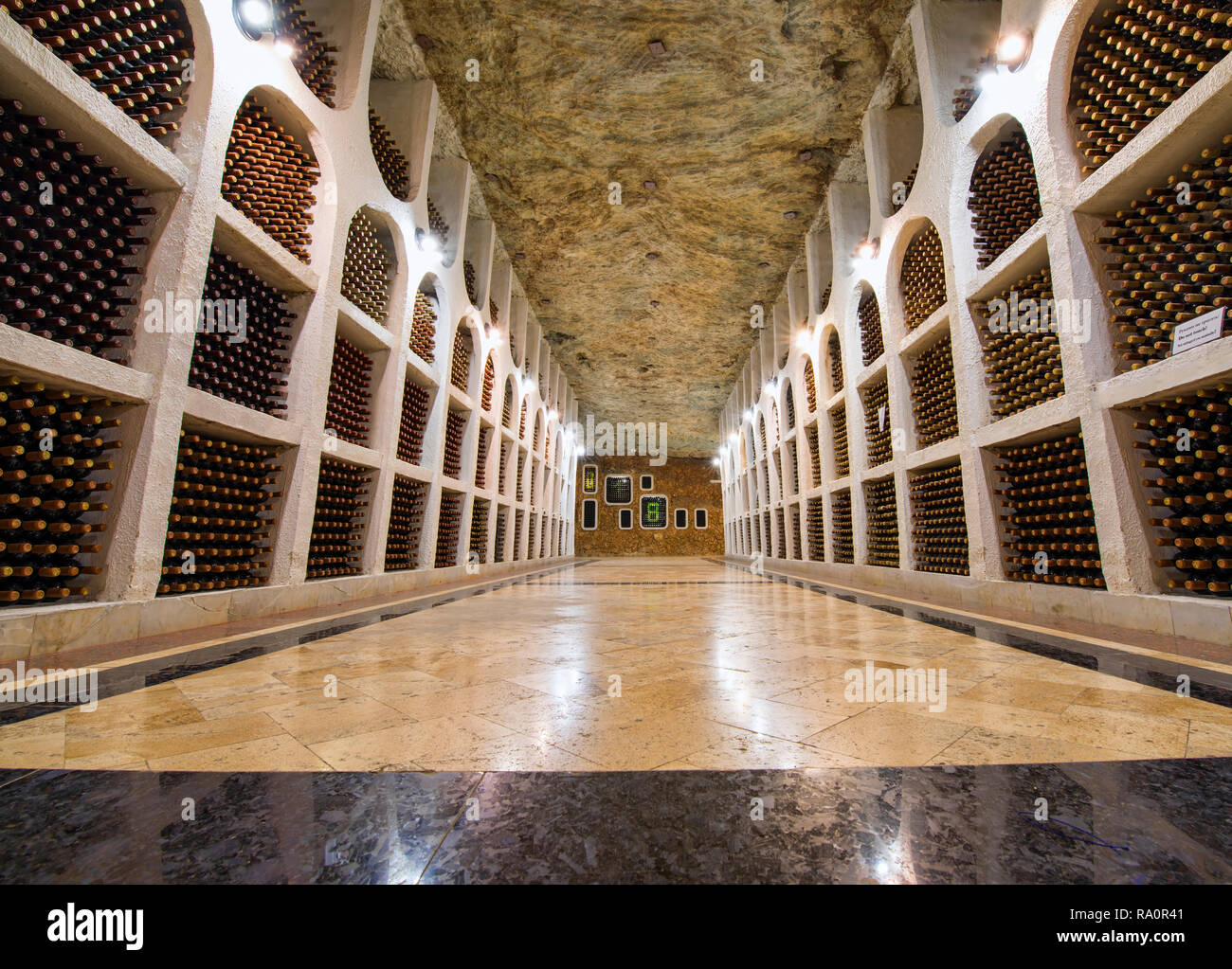 Wine bottles in winery cellars, old wine bottles storage in the ...