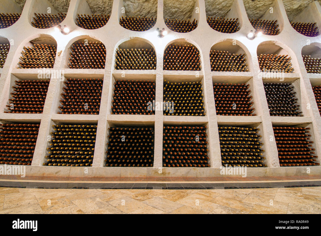 Wine bottles in winery cellars, old wine bottles storage in the ...
