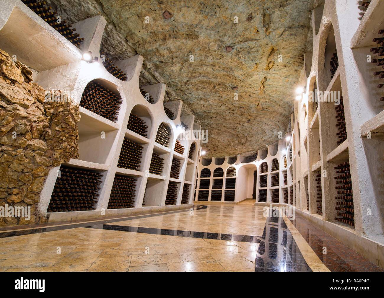 Wine bottles in winery cellars, old wine bottles storage in the ...