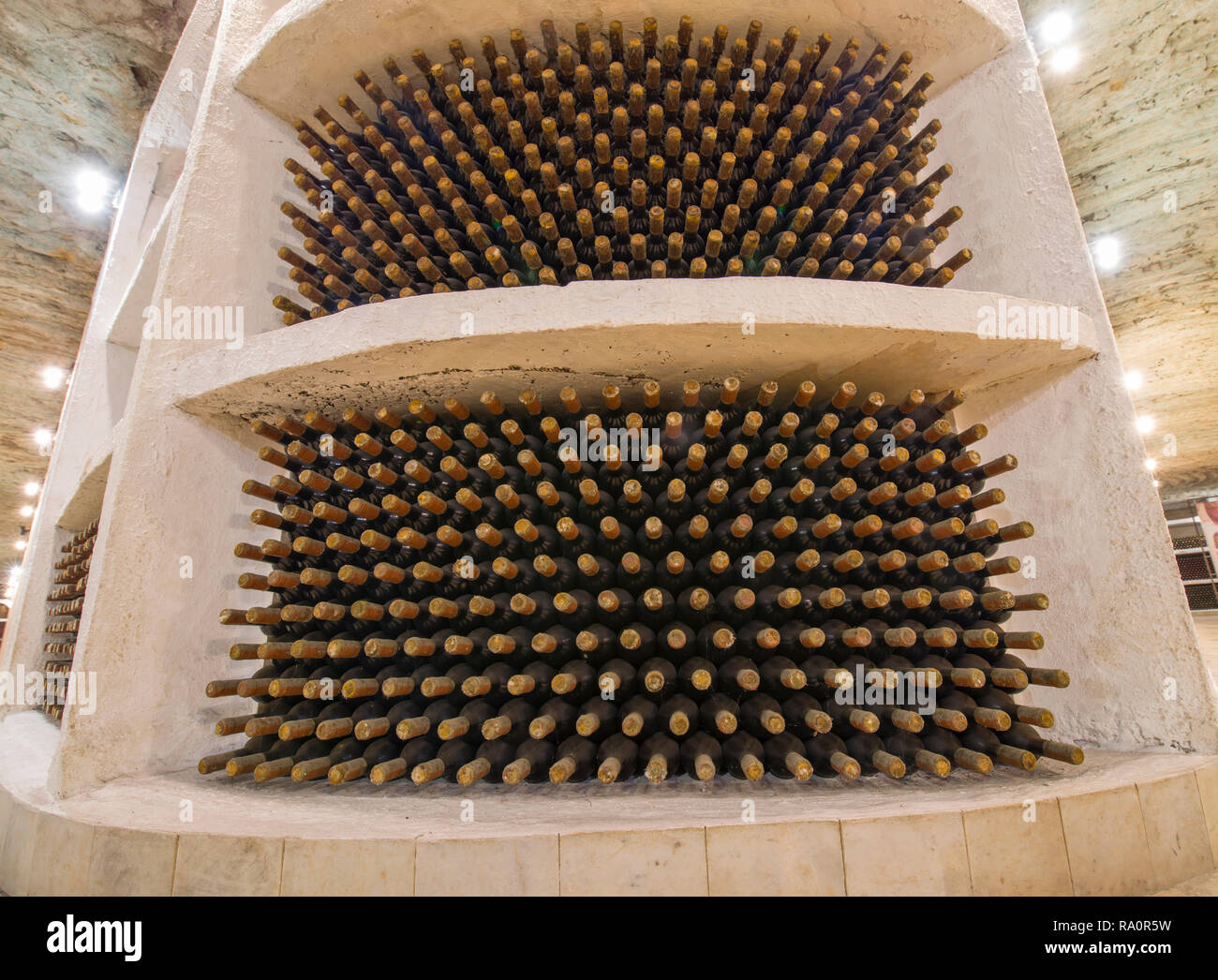 Wine bottles in winery cellars, old wine bottles storage in the ...