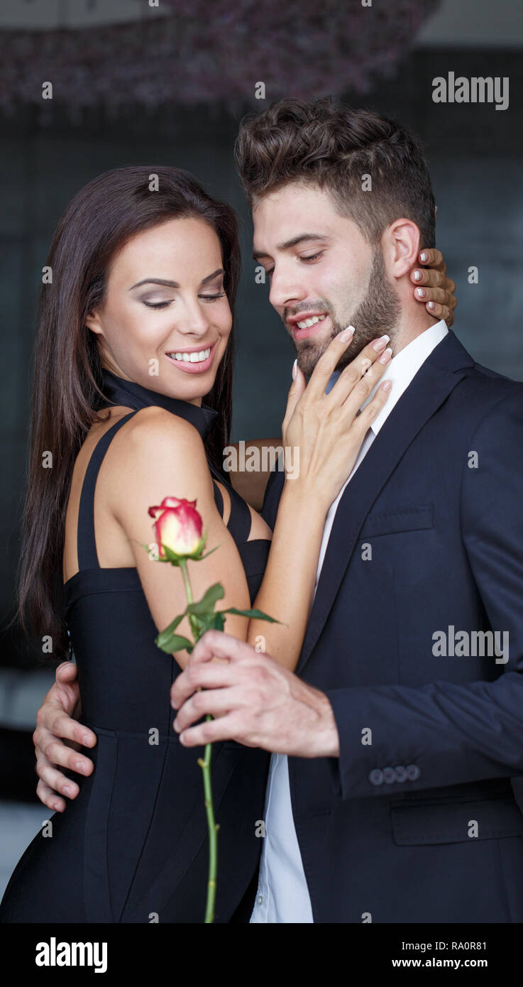 Young woman biting rose High Resolution Stock Photography and Images ...