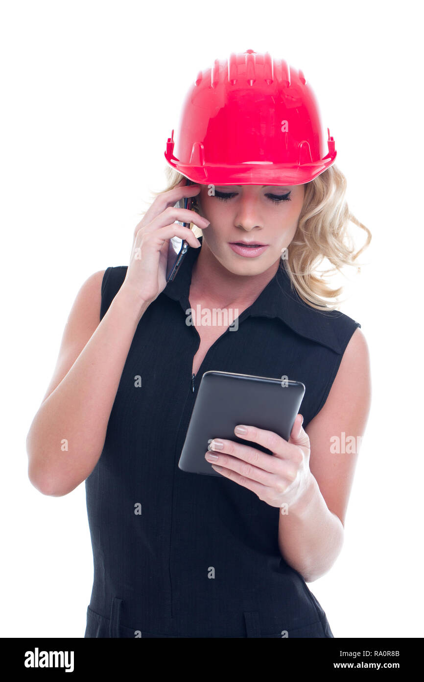Young construction manager calling and using tablet isolated on white ...