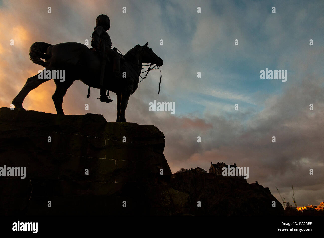 A dramatic picture of the Royal Scots Greys Monument in Edinburgh at ...