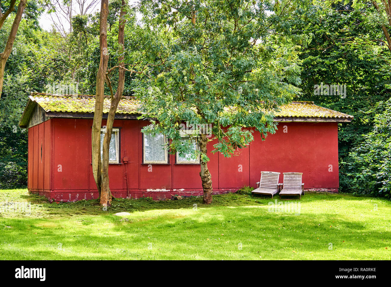 Old DDR summer cottage with trees in the garden Stock Photo - Alamy