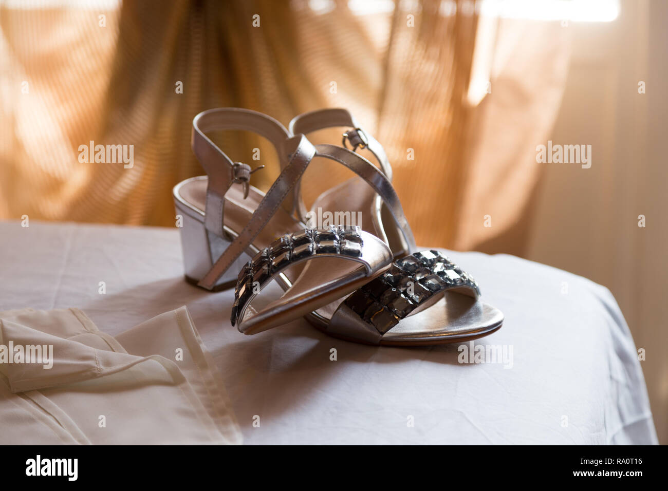 Shoes on bed hi-res stock photography and images - Alamy