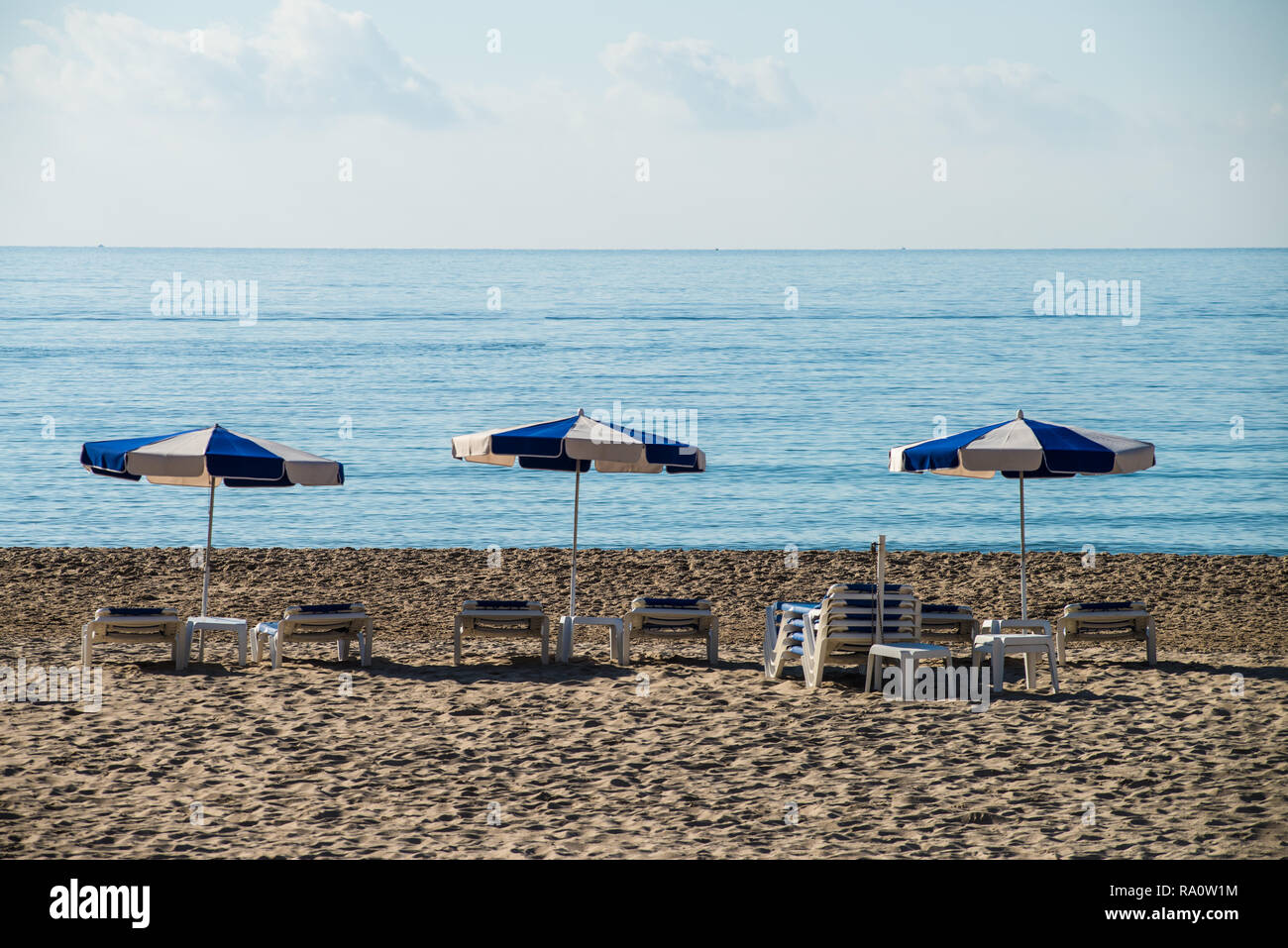 Early morning on a sunny Mediterranean beach Stock Photo - Alamy