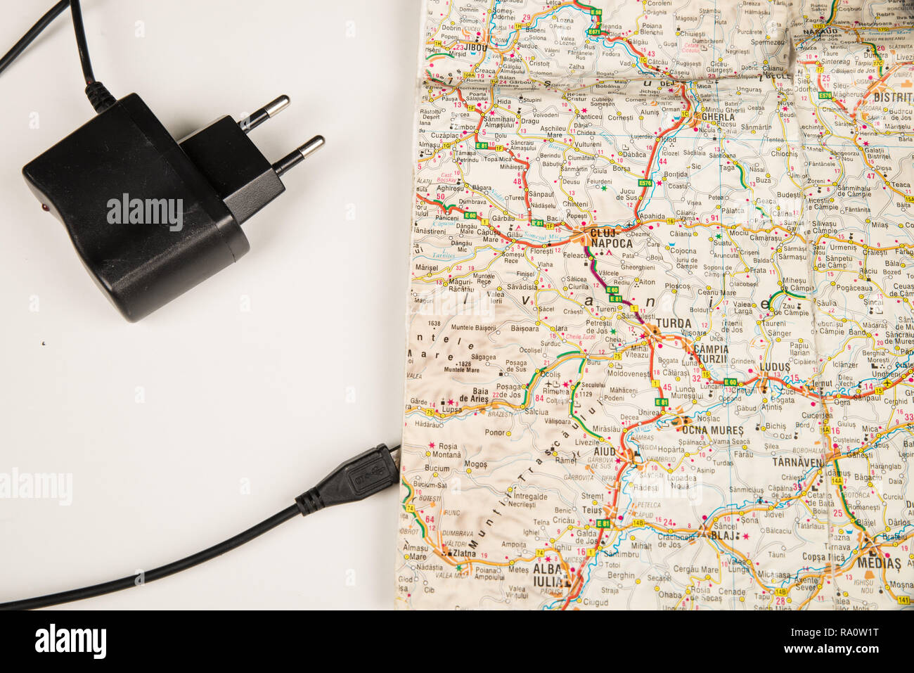 Paper map with a USB cable, a analog vs. digital concept Stock Photo ...
