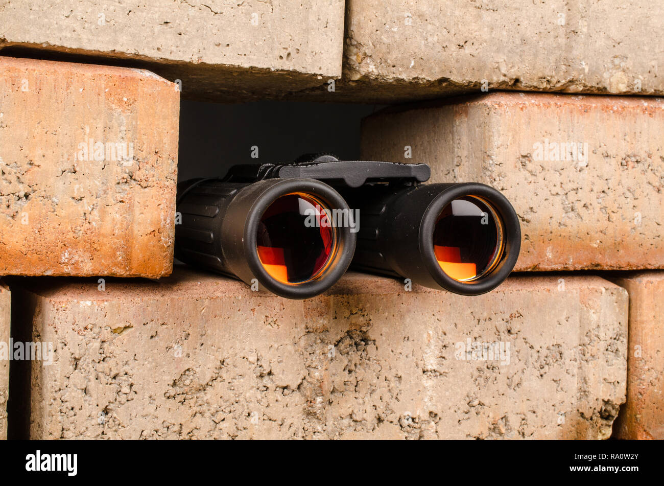 Spy glass sticking out of a wall, an immigration concept Stock Photo ...