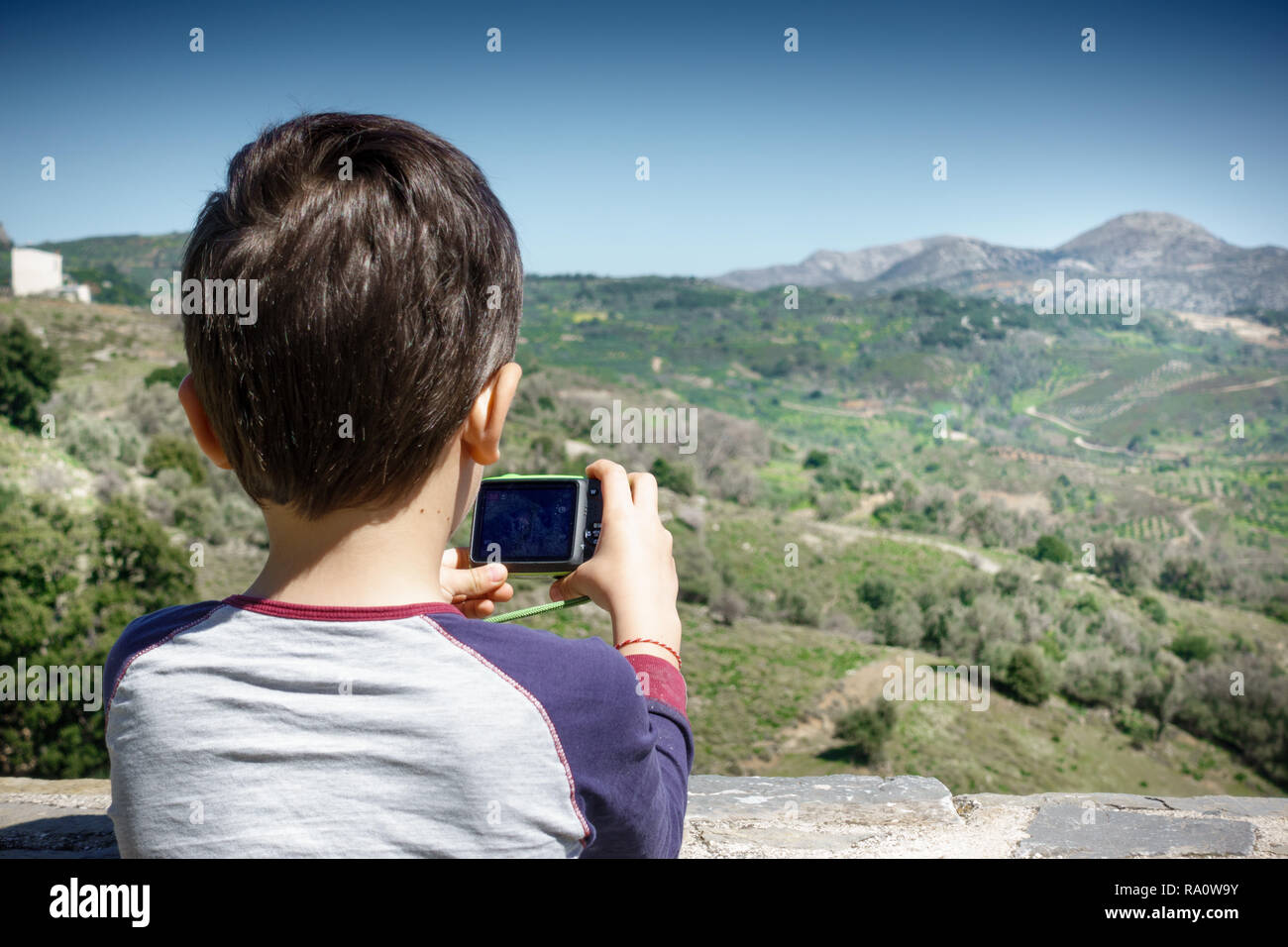 Boy and camera and rear view hi-res stock photography and images - Alamy