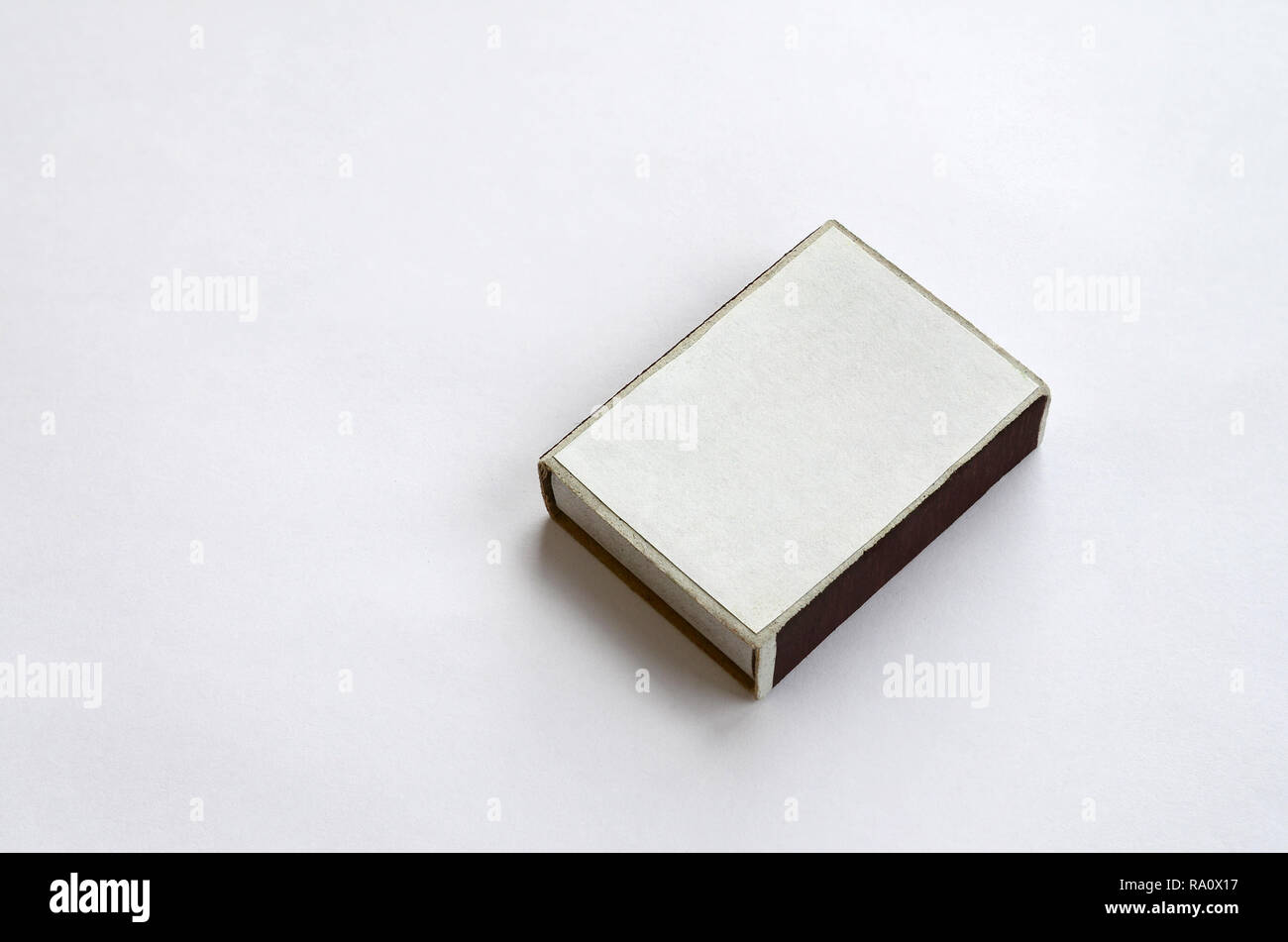 Closed cardboard matchbox on a white background. Flat lay minimal. Top ...