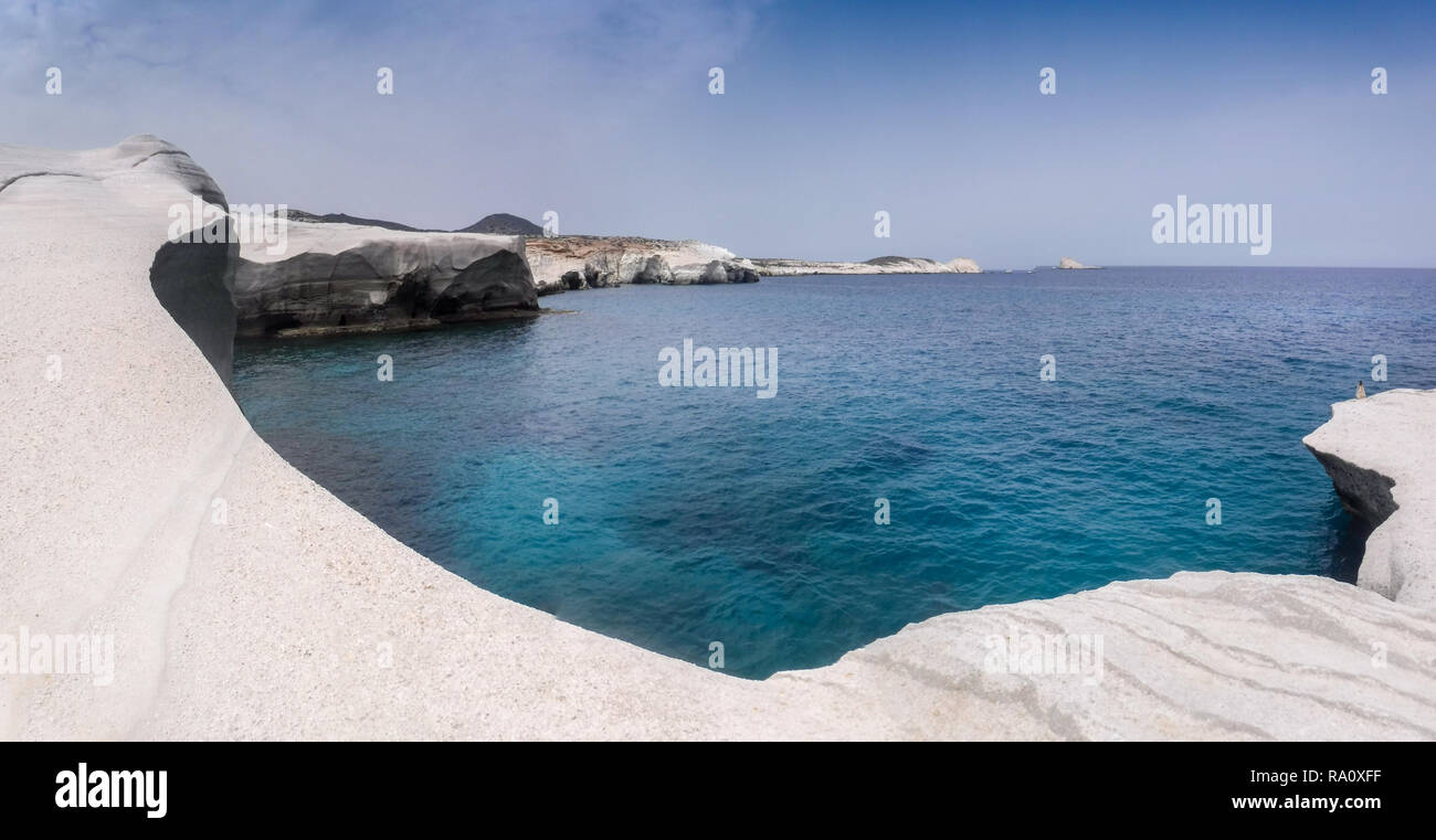 White rock cliff by sea Milos Island Greece Stock Photo - Alamy