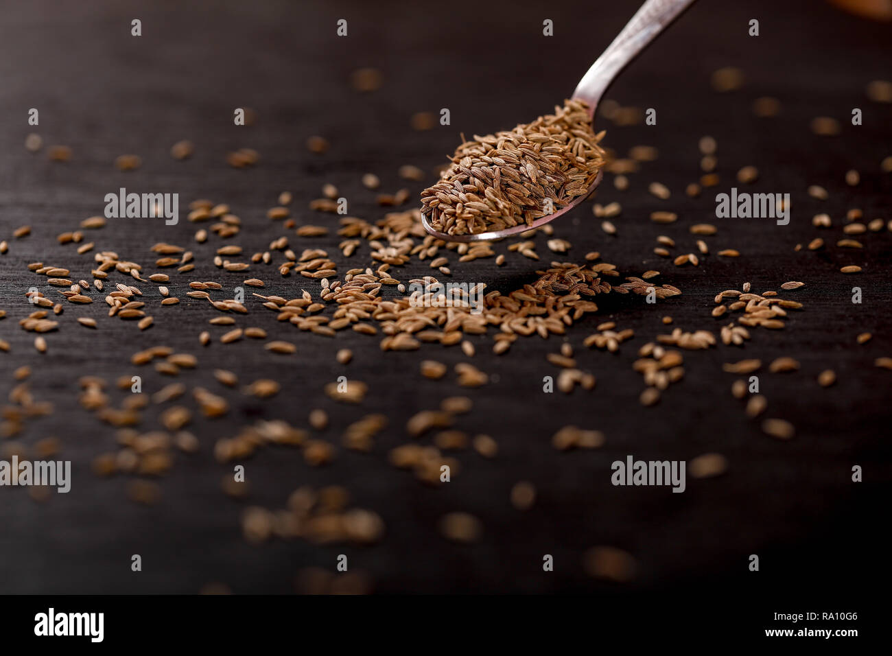 Whole cumin seeds hi-res stock photography and images - Alamy