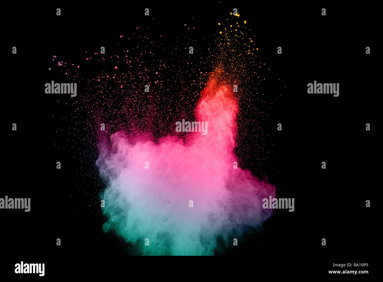 Abstract multi color powder explosion on black background. Freeze ...