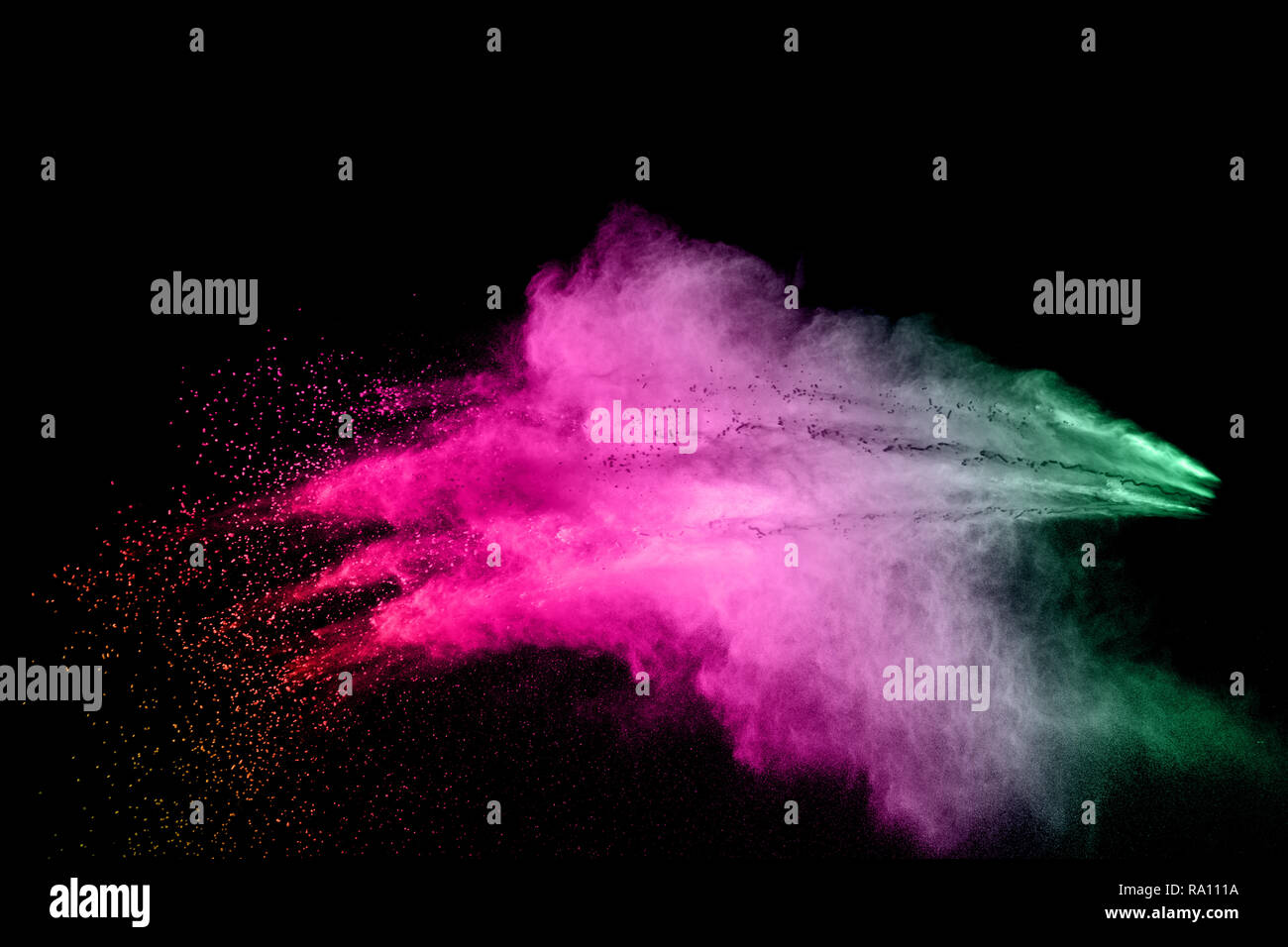 Abstract multi color powder explosion on black background. Freeze ...