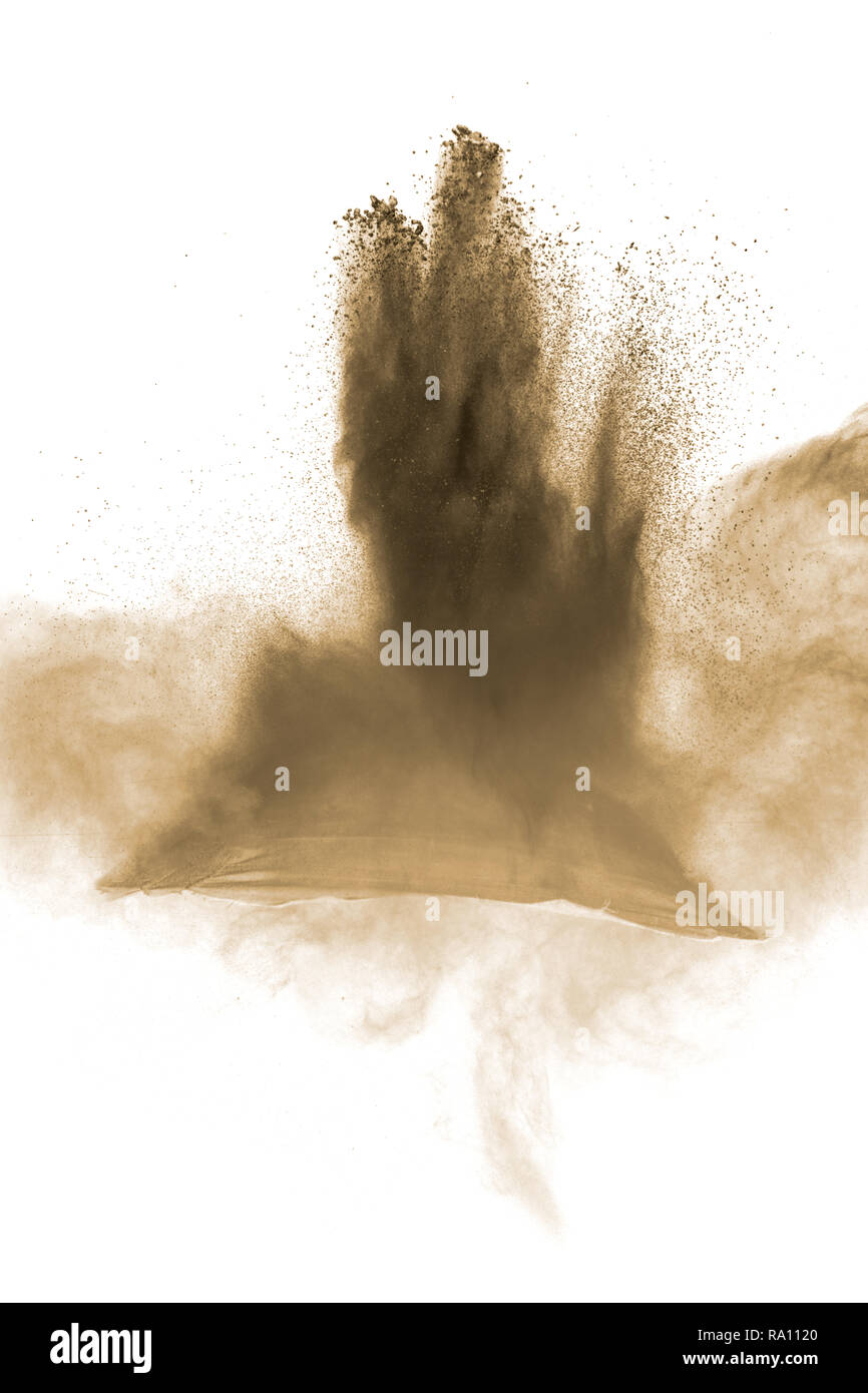 Brown particles splattered on white background. Brown dust splashing ...