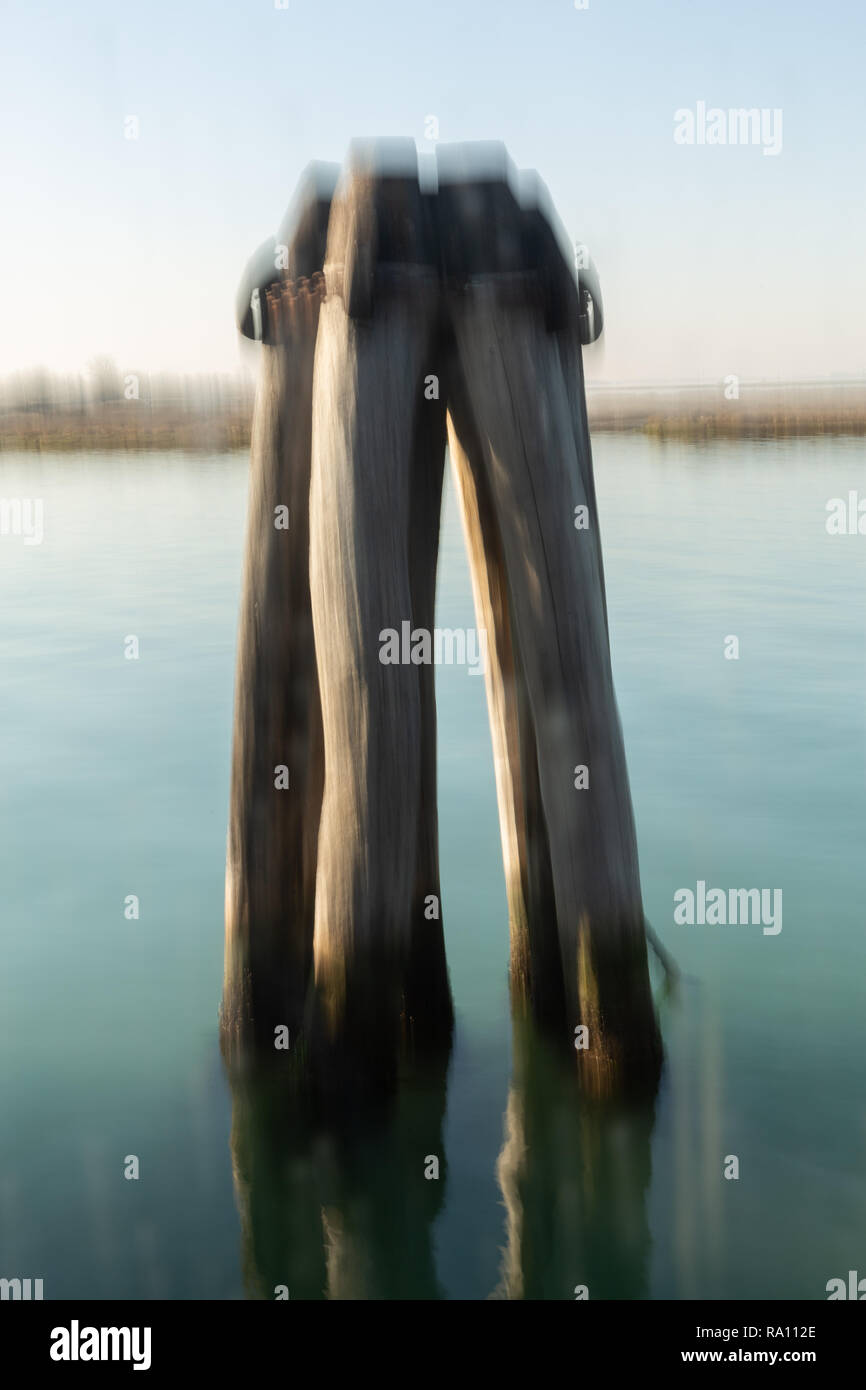 abstract blur image of wooden pylons in the Venetian lagoon Stock Photo ...