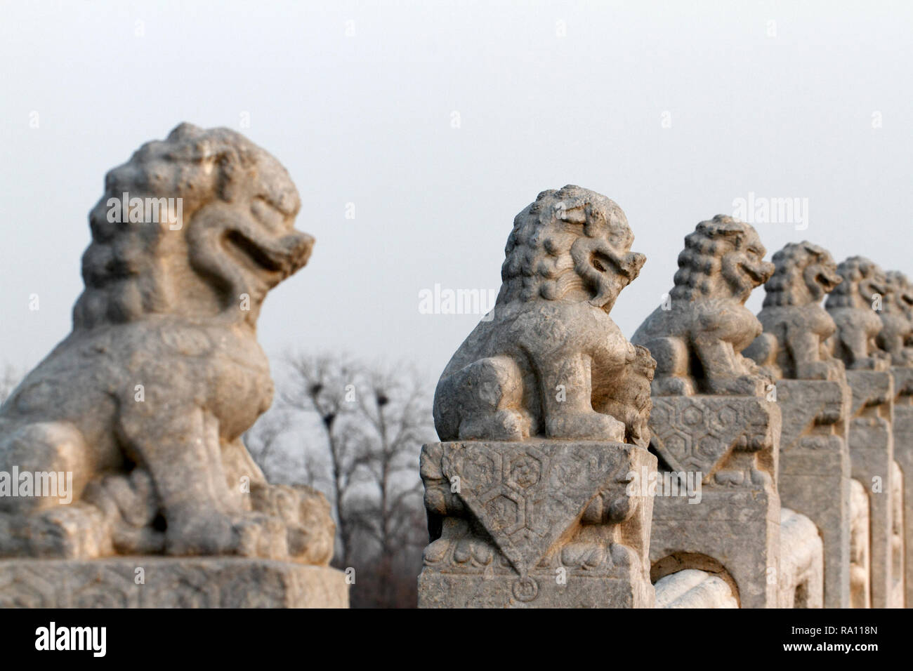 Stone Lions on the bridge over the Kunmiga LAke, Summer Palace, Beijing ...