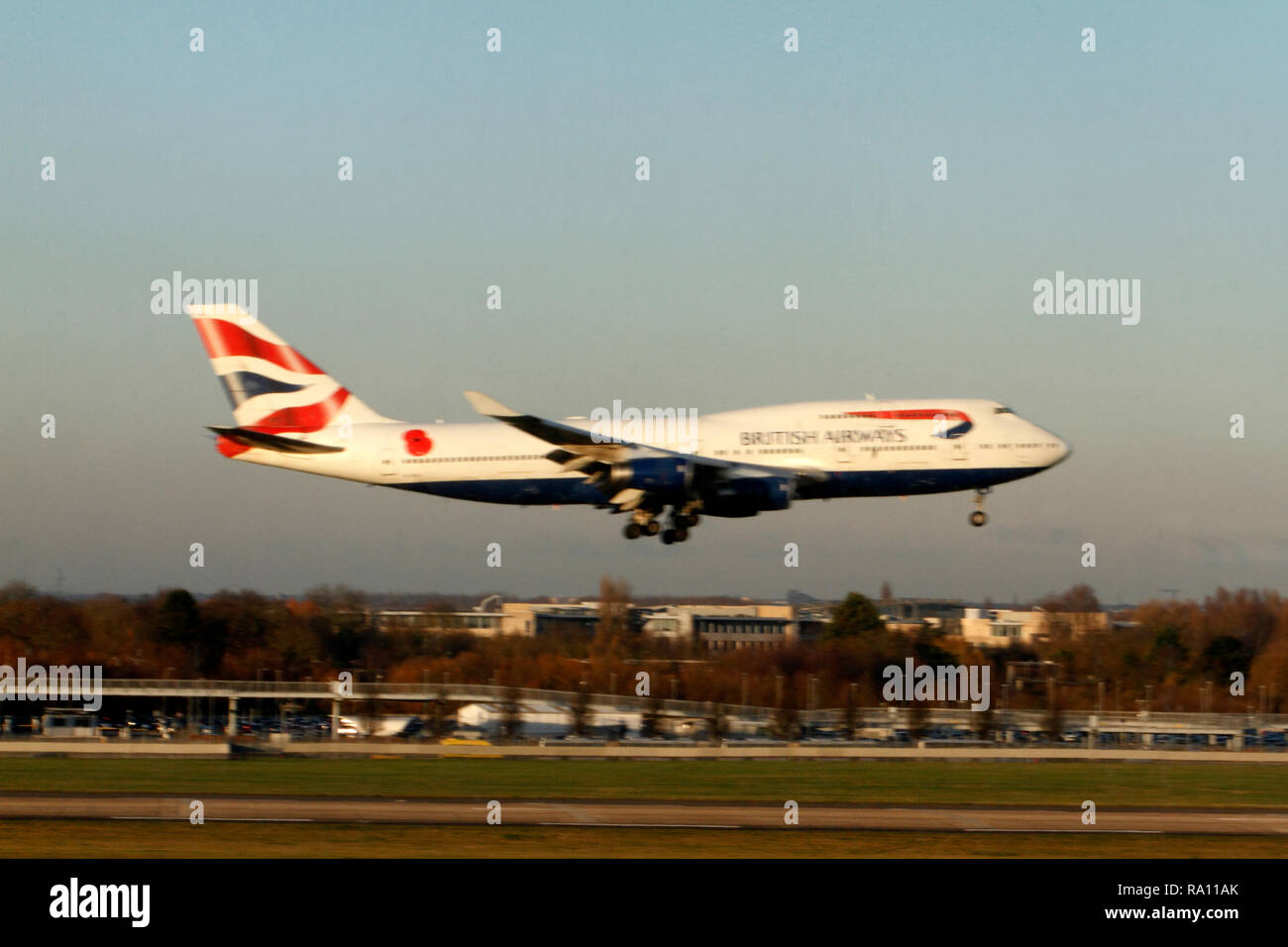 speeding BA Jumbo jet coming in to land at Heathrow airport UK. Boeing ...