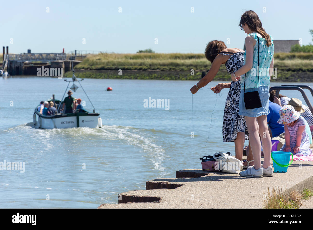Family Fishing On Jetty High Resolution Stock Photography and Images ...