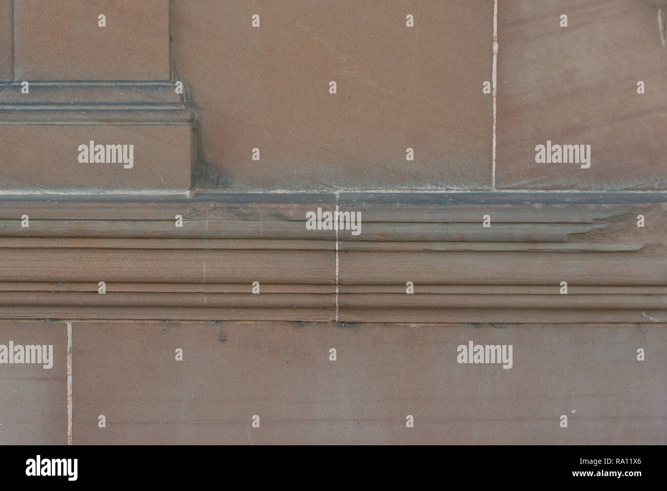 Stone wall texture with moldings Stock Photo - Alamy