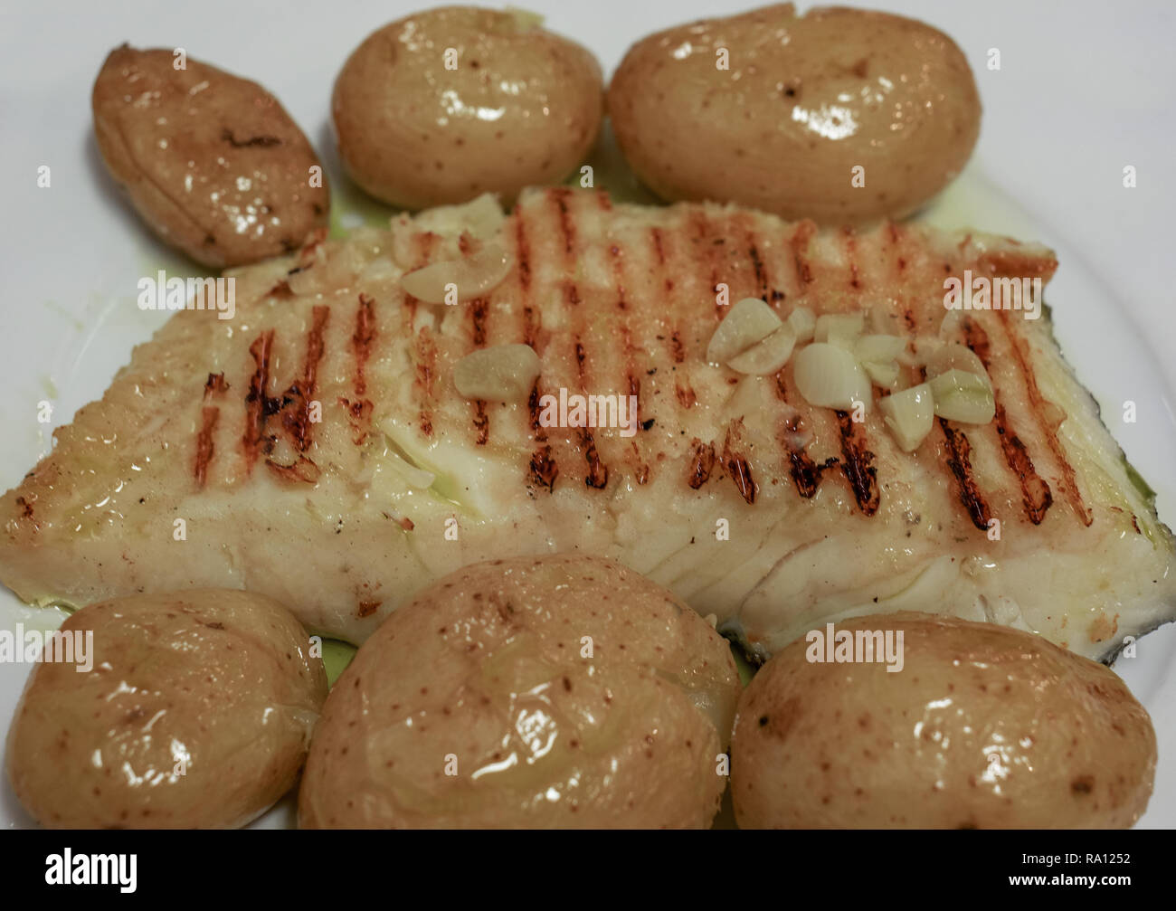 Lisbon - Portugal, local dish,grilled fish fillet with a side of ...